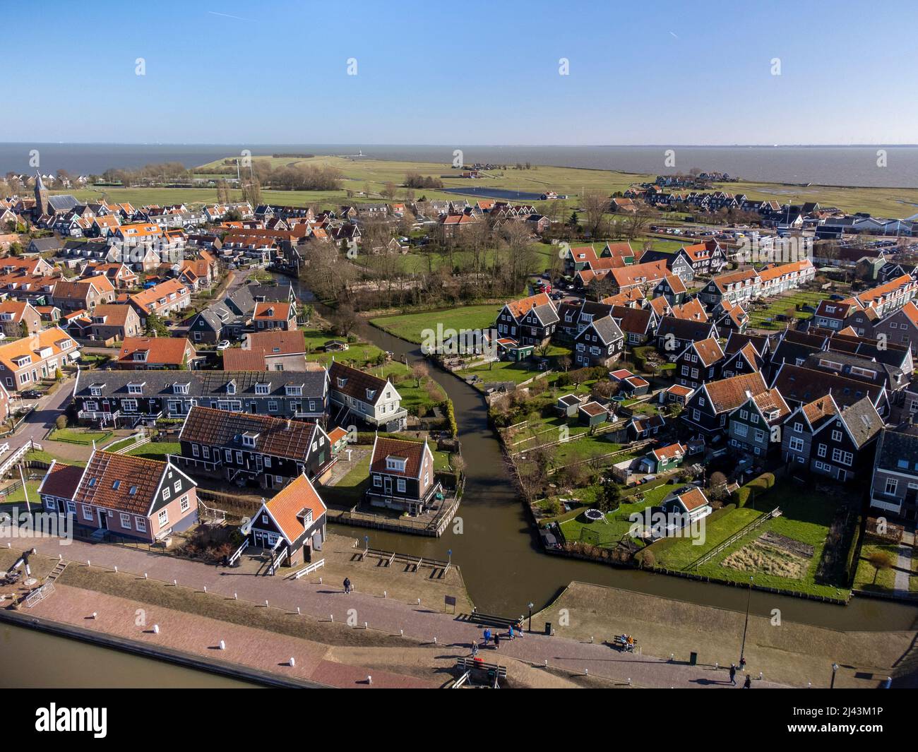Aerial view on small Dutch town Marken with wooden houses located on ...
