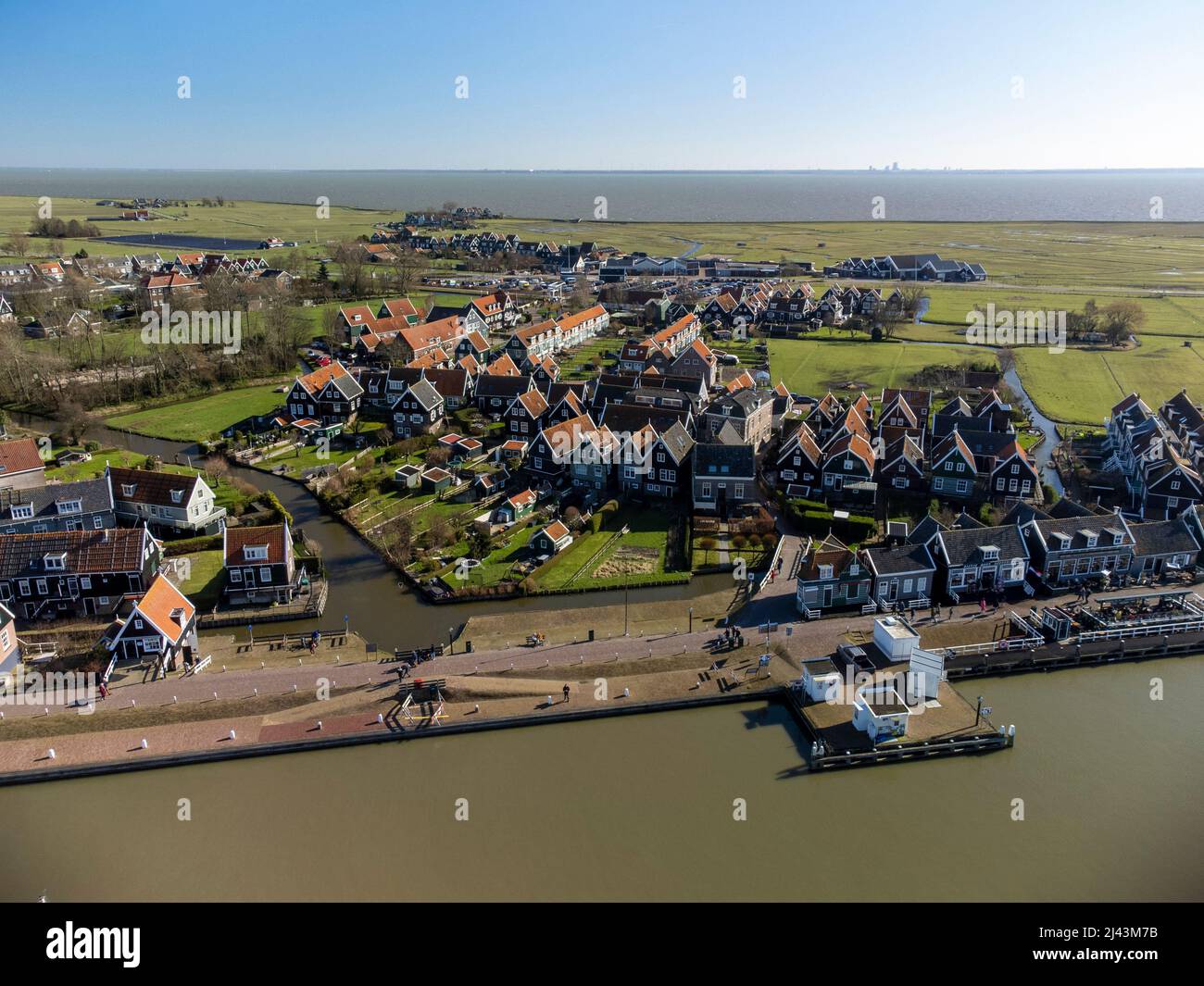 Aerial view on small Dutch town Marken with wooden houses located on ...