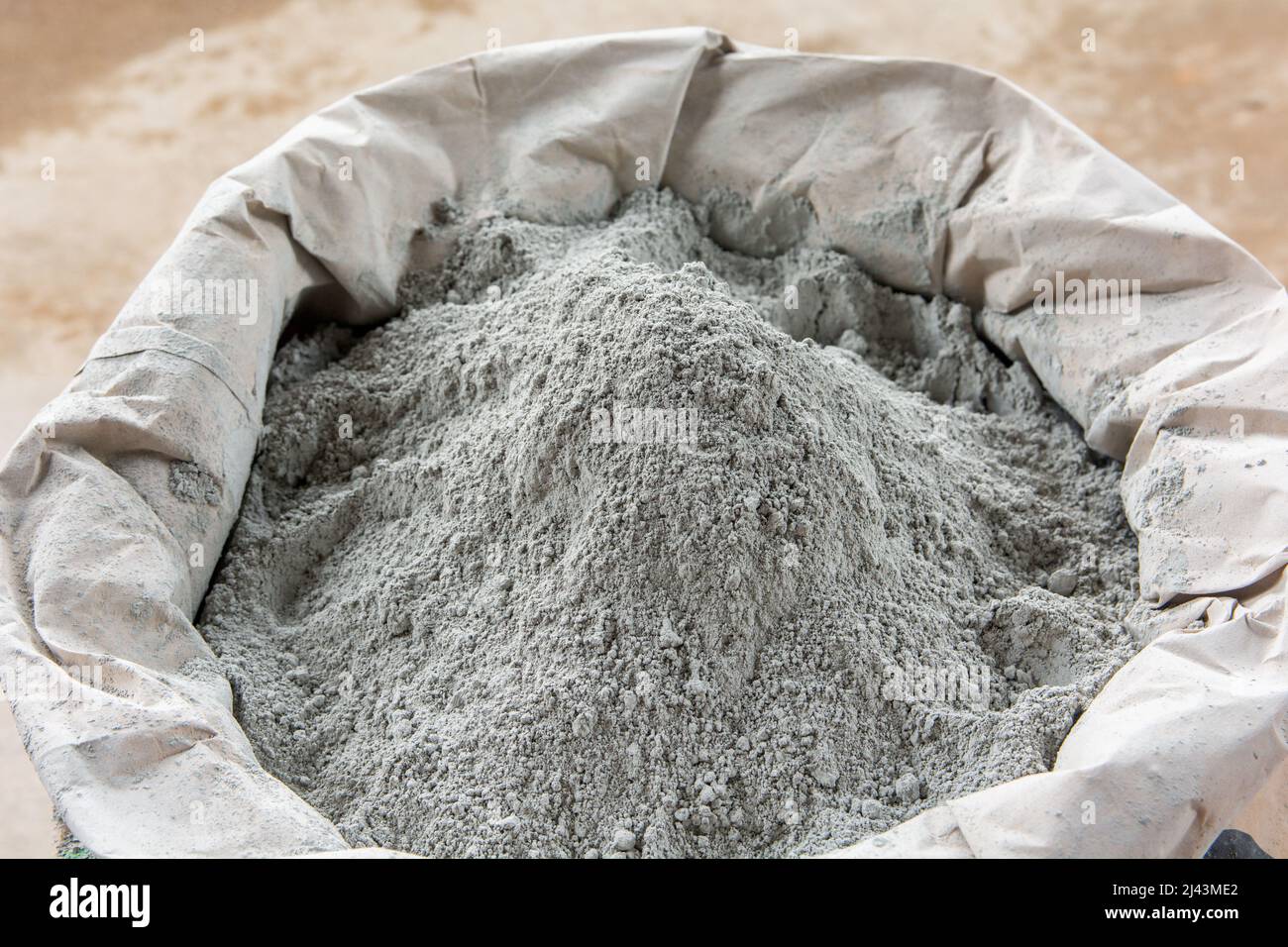 Cement powder in bag package Stock Photo - Alamy