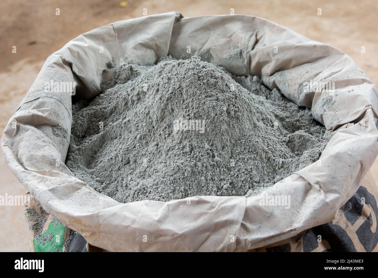 Cement powder in bag package Stock Photo - Alamy