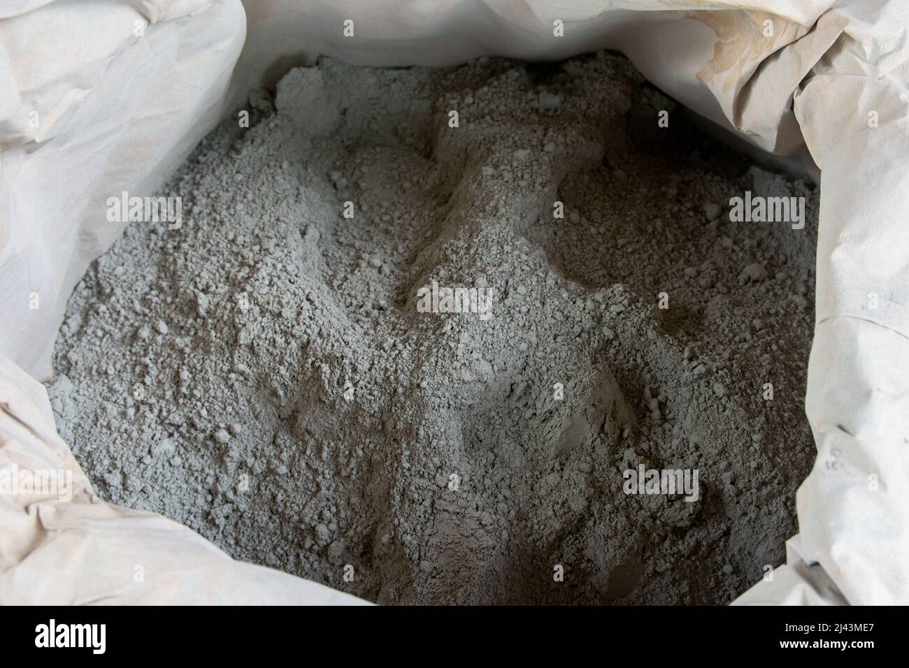 Cement powder in bag package Stock Photo - Alamy