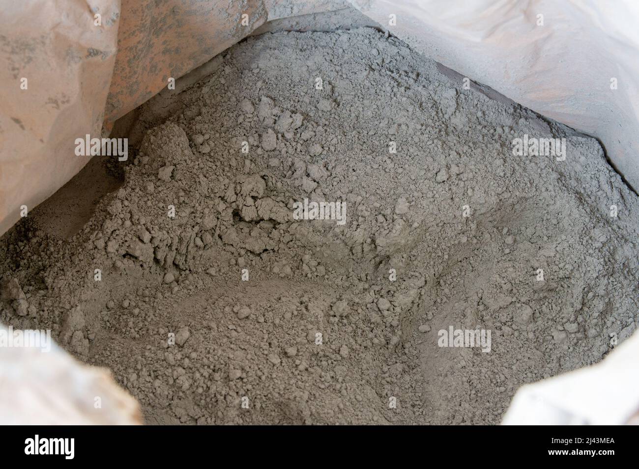 Cement powder in bag package Stock Photo - Alamy