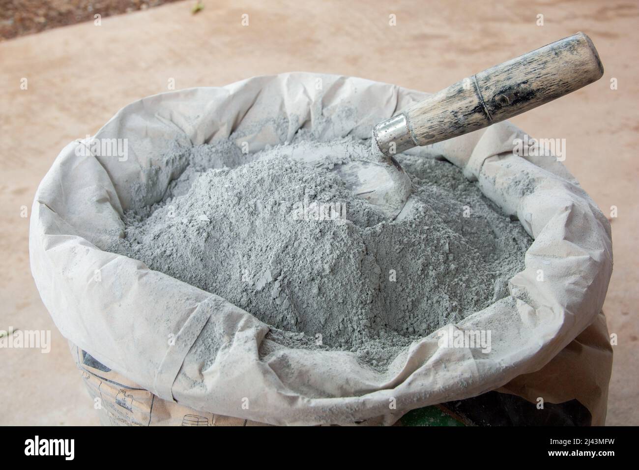 Cement powder in bag package Stock Photo - Alamy