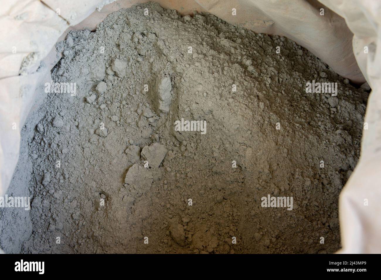 Cement powder in bag package Stock Photo - Alamy