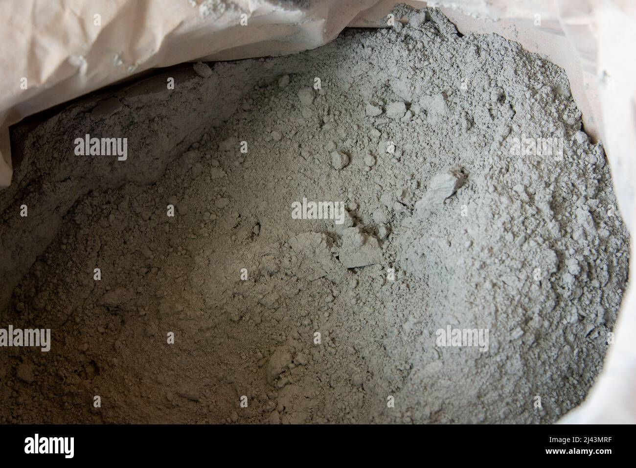 Cement powder in bag package Stock Photo - Alamy