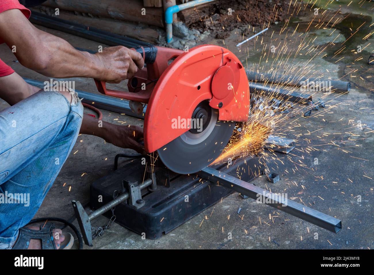 Worker cut steel with cut off wheel saw, cutting wheels Stock Photo - Alamy