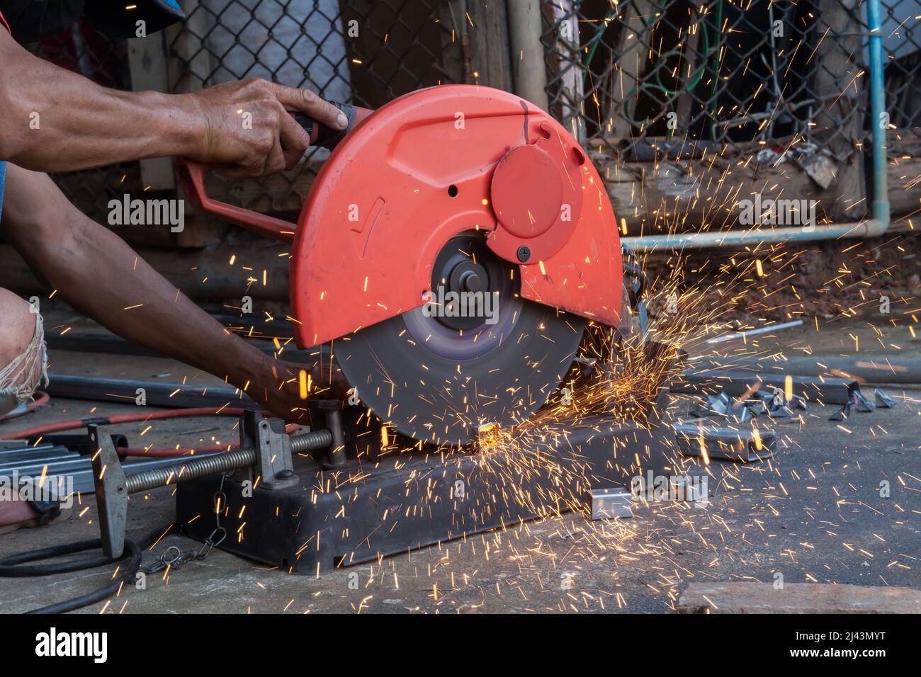 Worker cut steel with cut off wheel saw, cutting wheels Stock Photo - Alamy