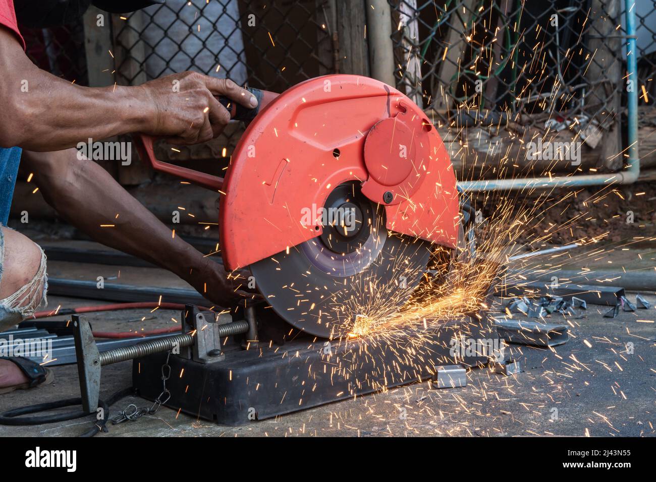 Worker cut steel with cut off wheel saw, cutting wheels Stock Photo - Alamy