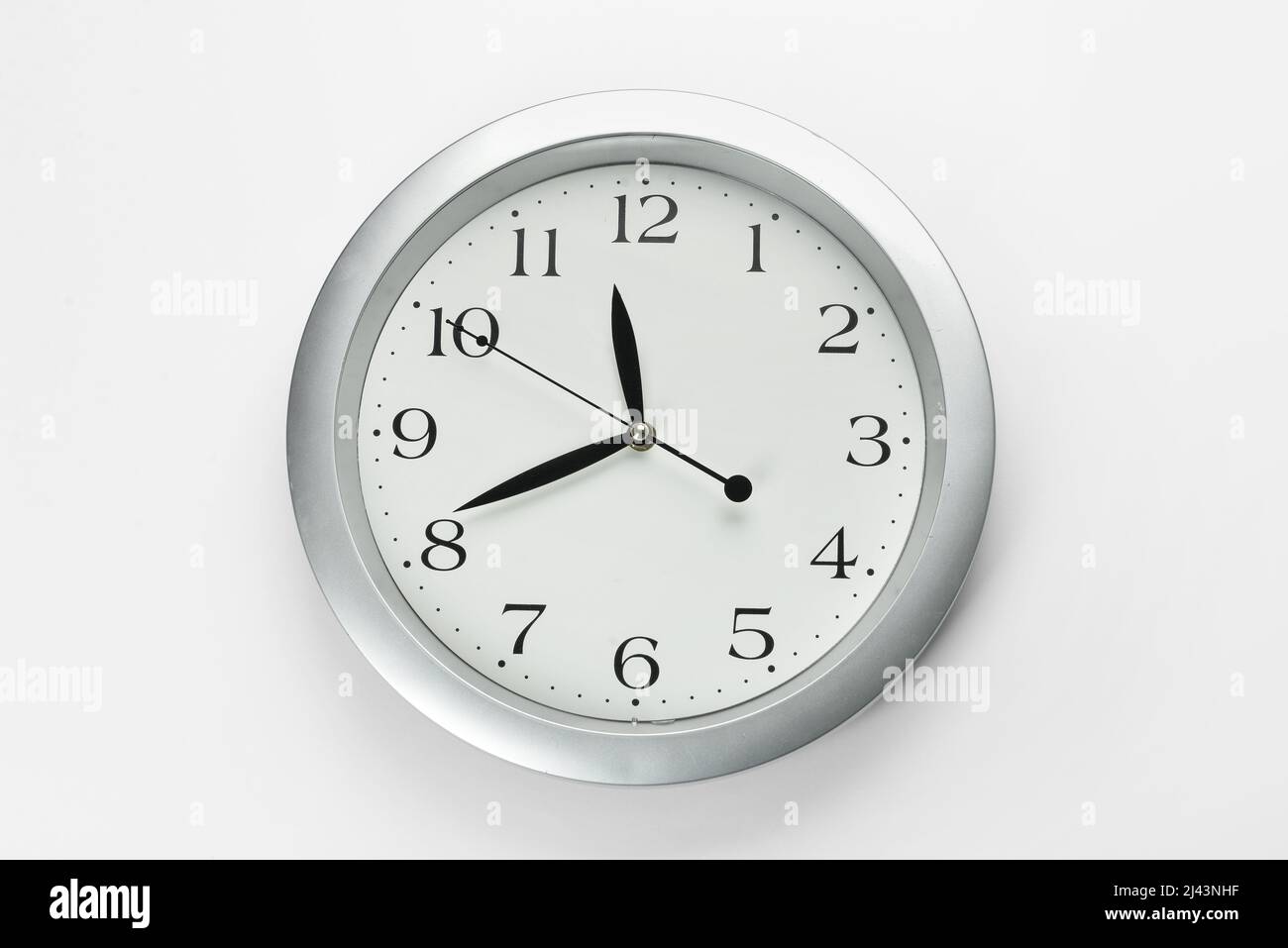 New modern clock on white background Stock Photo - Alamy