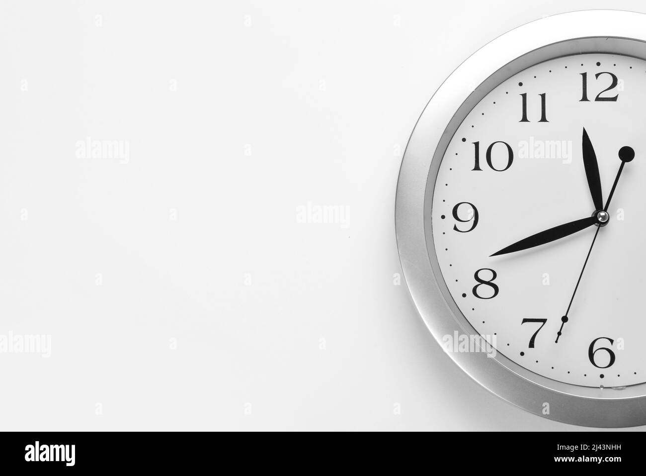New modern clock on white background Stock Photo - Alamy