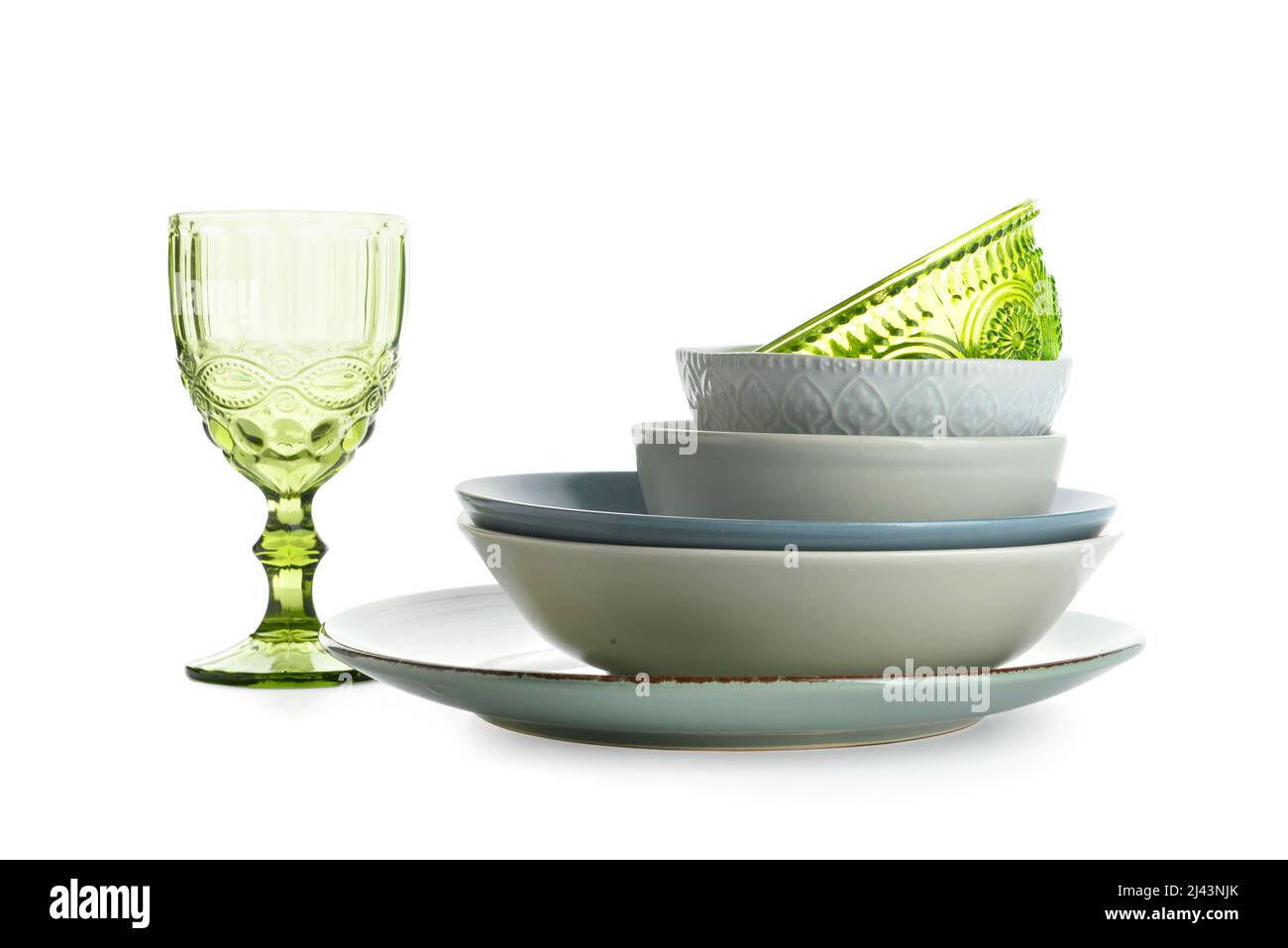 Set of stylish dinnerware on white background Stock Photo - Alamy