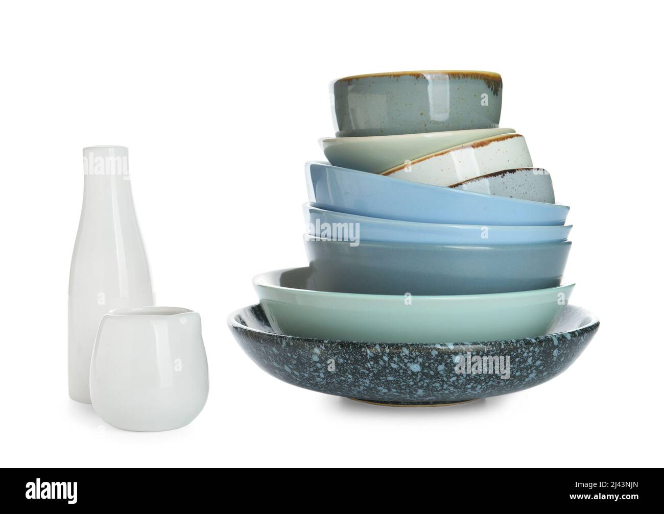 Set of stylish dinnerware on white background Stock Photo - Alamy