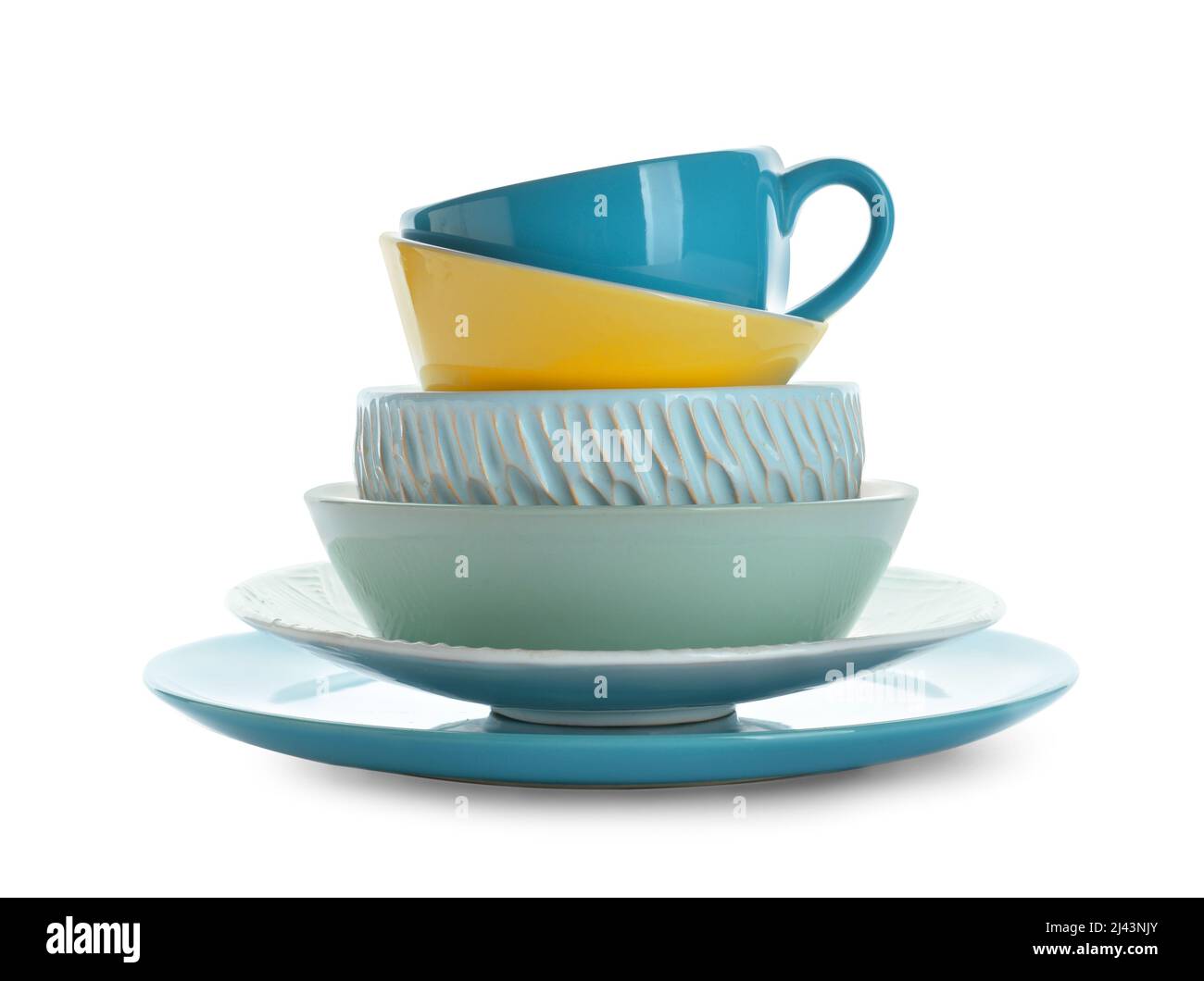 Set of stylish dinnerware on white background Stock Photo - Alamy