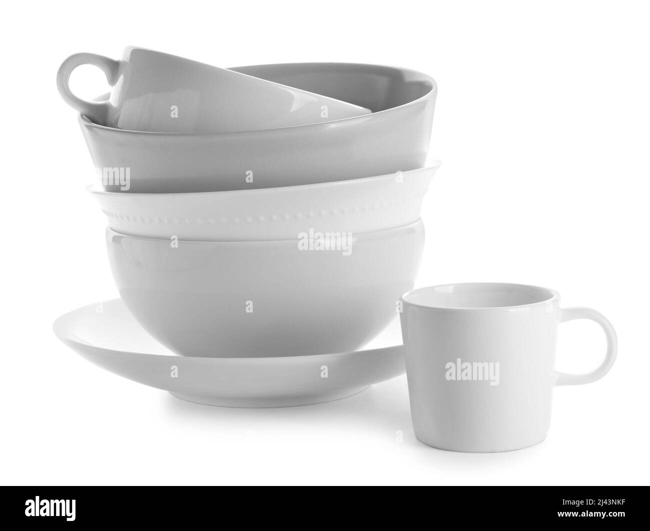 Set of stylish dinnerware on white background Stock Photo - Alamy