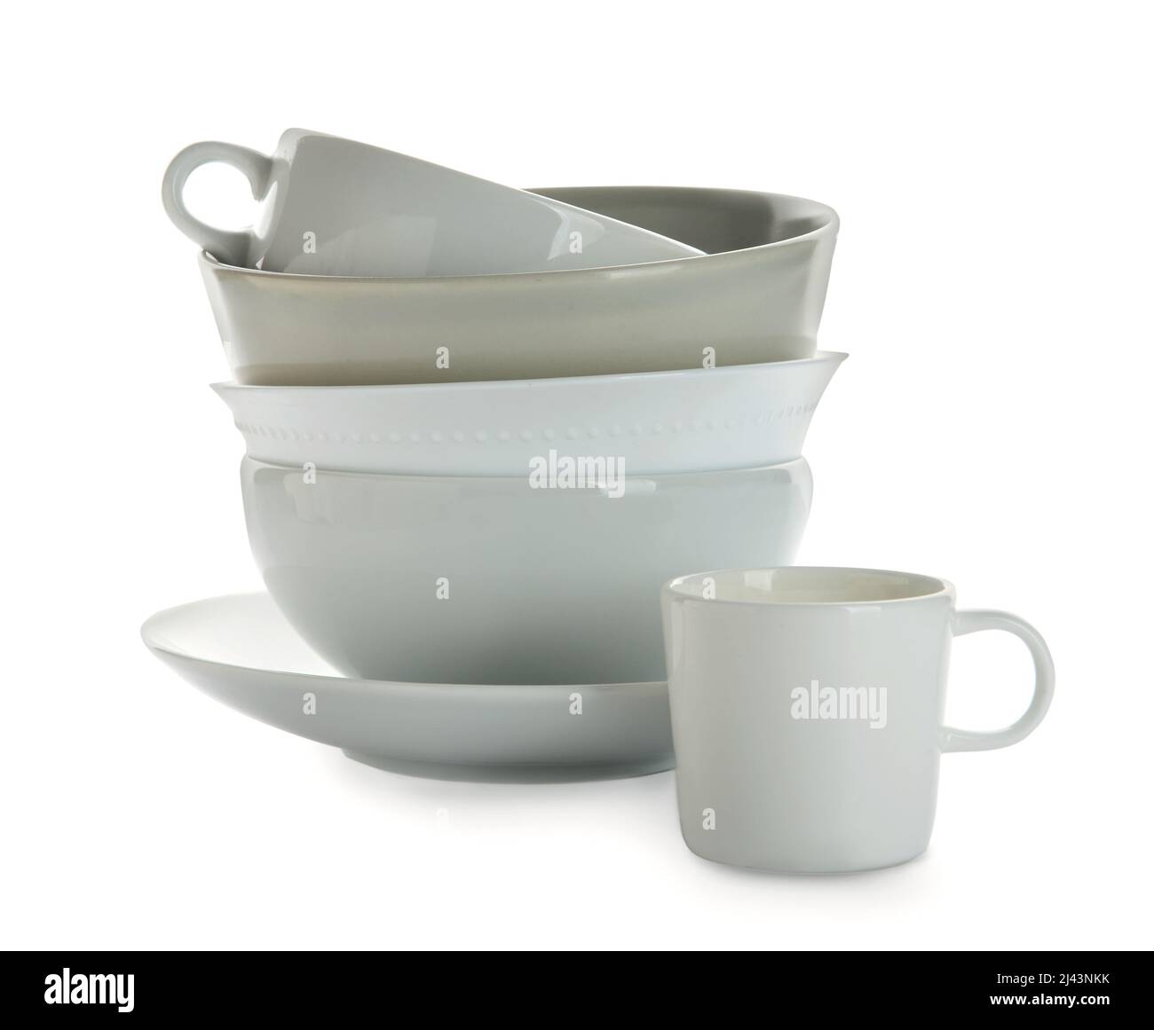 Set of stylish dinnerware on white background Stock Photo - Alamy