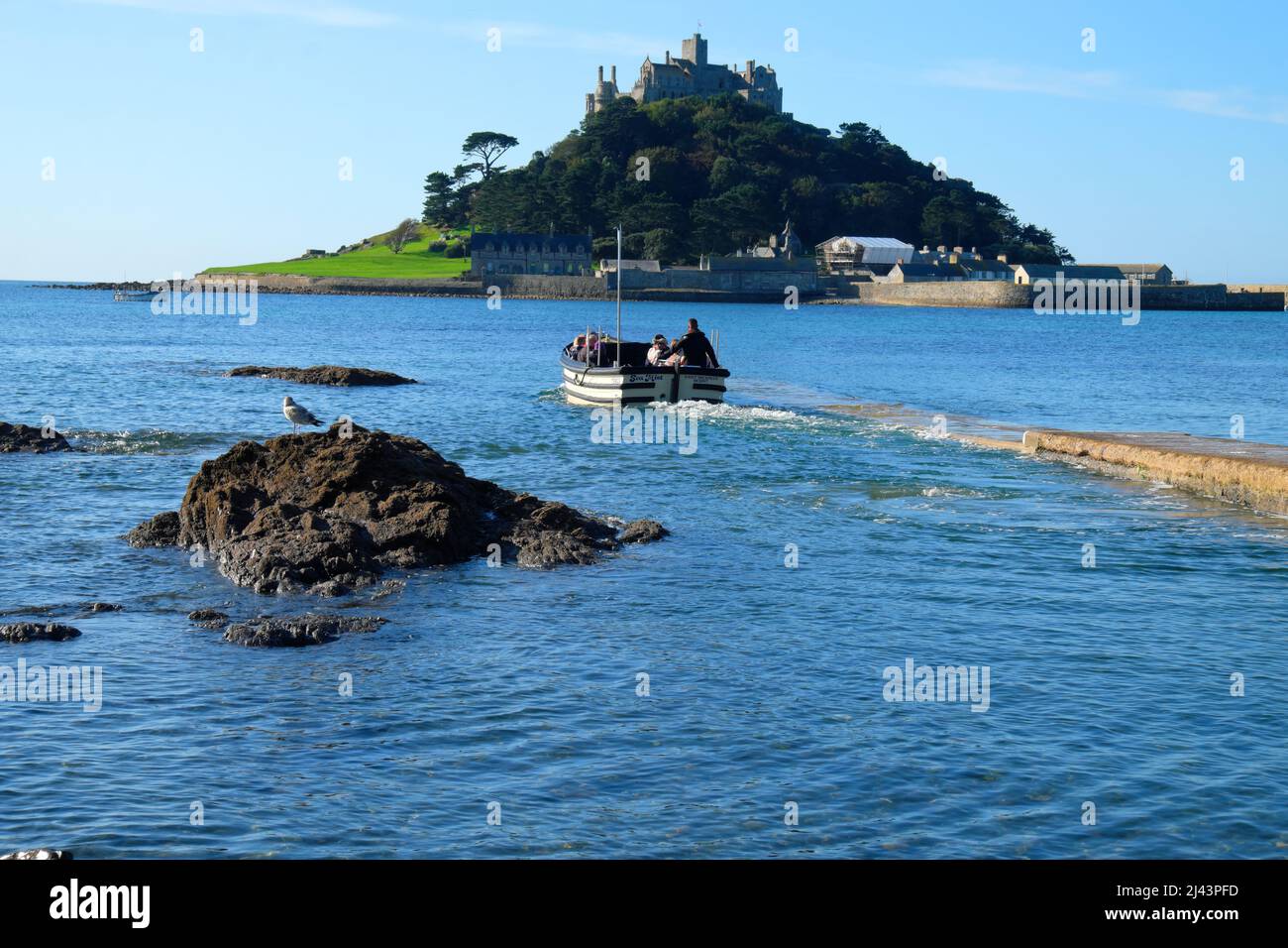 A boat of tourist's cross St Mounts Bay to St Michael's Mount from ...