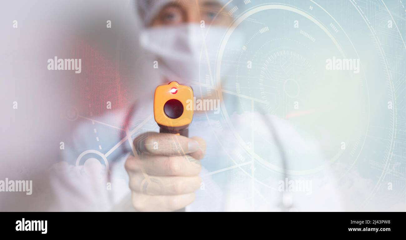 Scope over caucasian female health worker holding a temperature gun ...