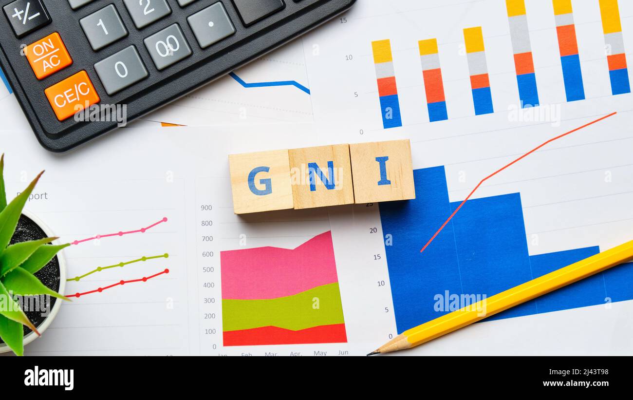 Acronym GNI or Gross National Income. Letters on cubes on the ...
