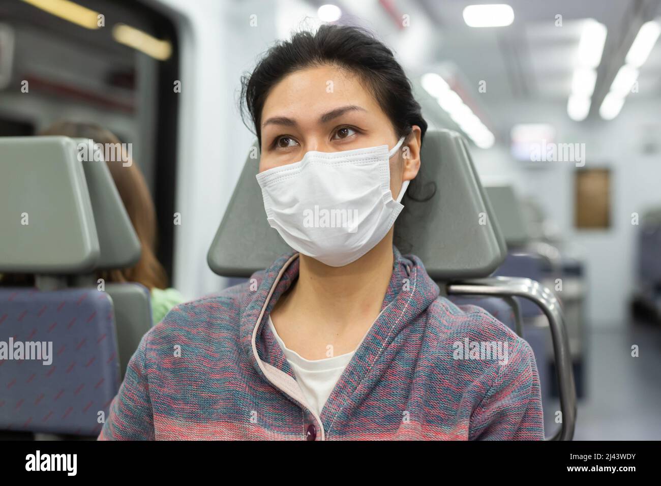 Female passenger in suburban train hi-res stock photography and images ...