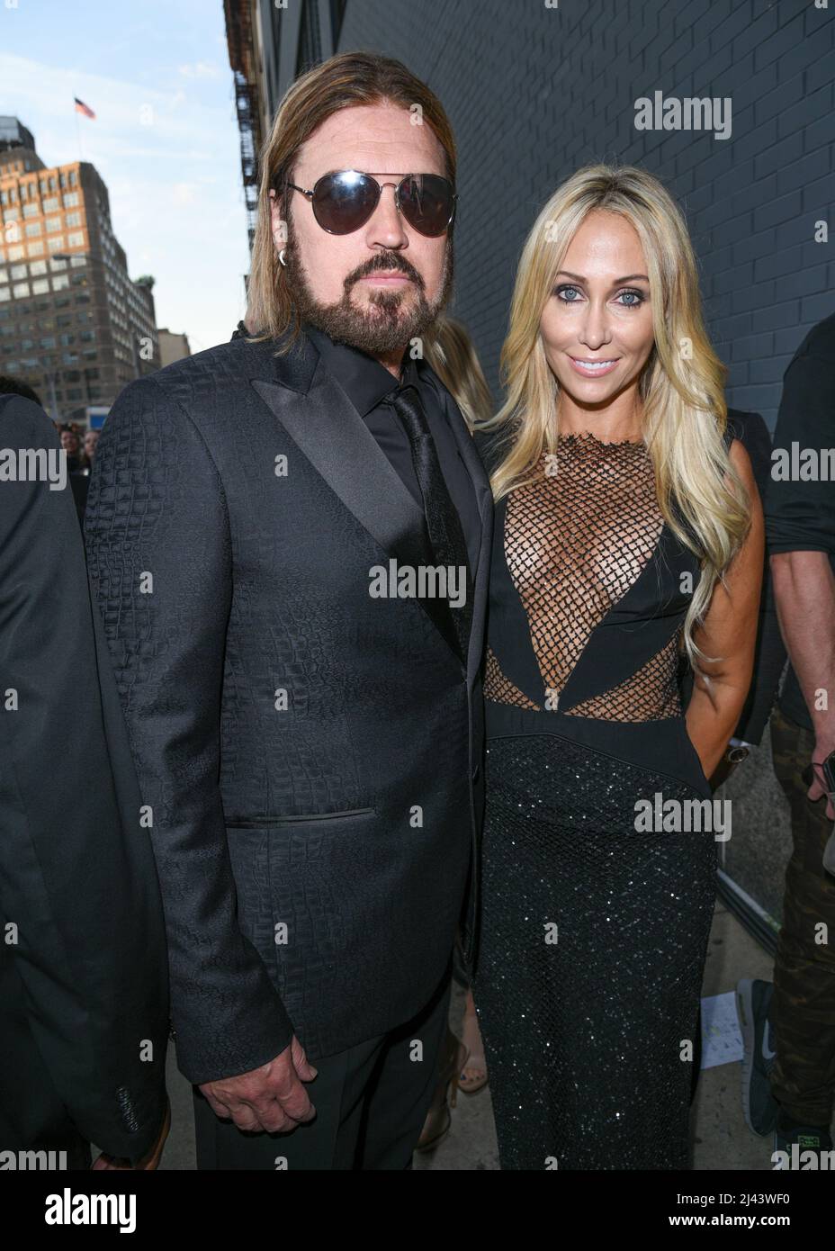 Billy Ray Cyrus and Tish Cyrus attend the 2015 amfAR Inspiration Gala ...