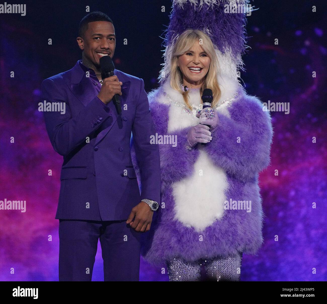 THE MASKED SINGER, from left: host Nick Cannon, Lemur (revealed as ...