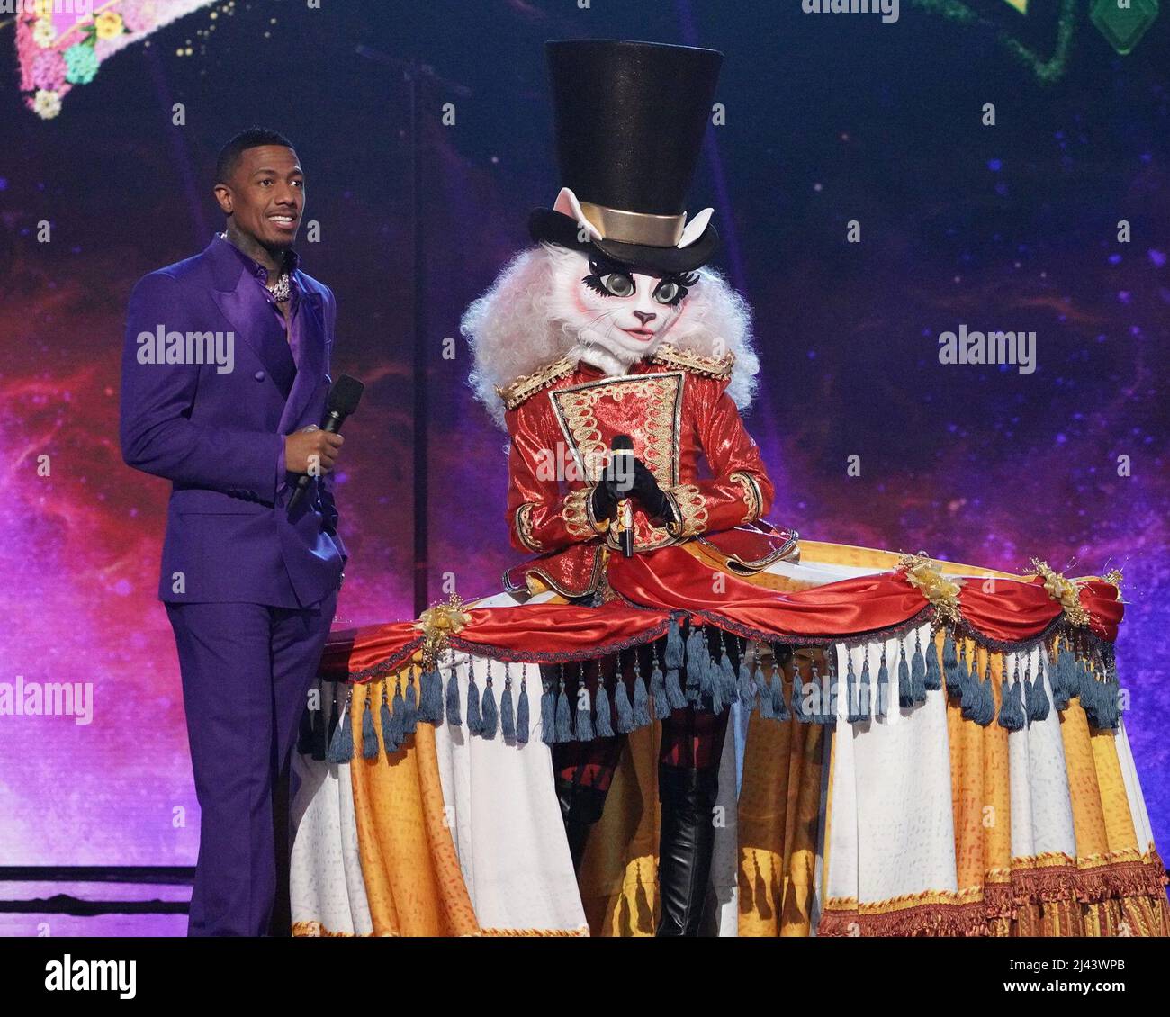THE MASKED SINGER, from left: host Nick Cannon, Ringmaster, Masking For ...