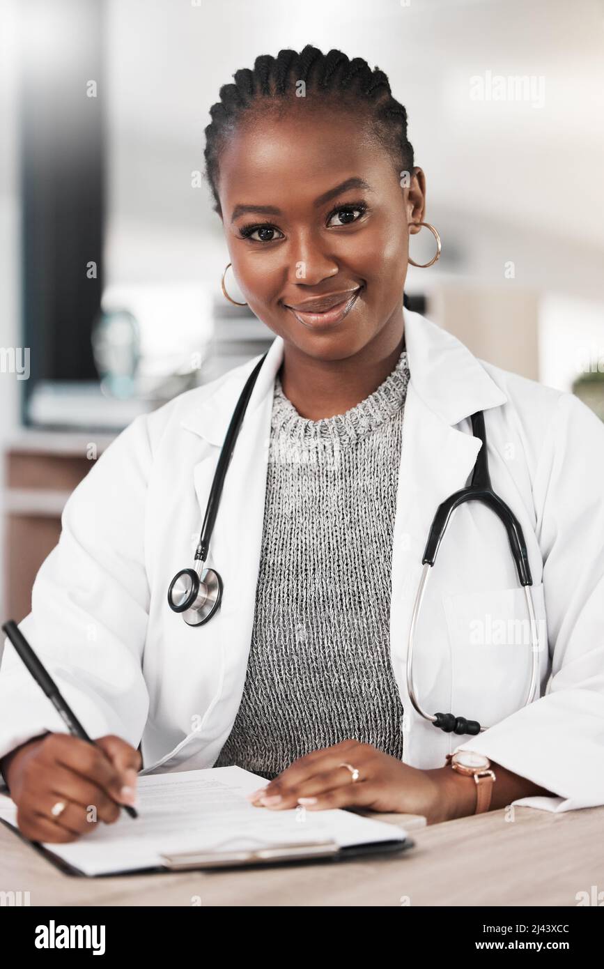 Come see me for a clean bill of health. Shot of a young doctor making ...