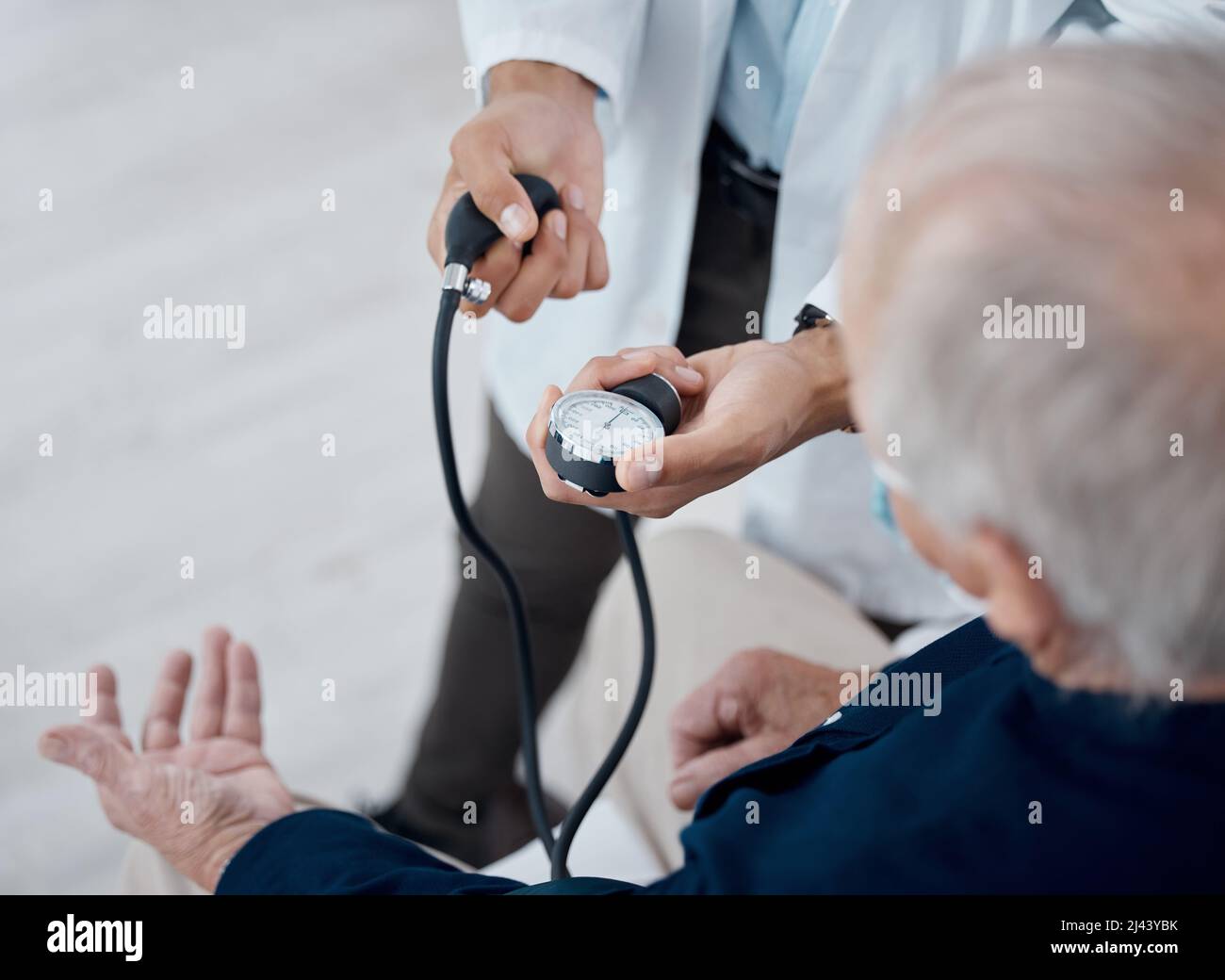 Regular blood pressure checks are important. Shot of an unrecognizable ...