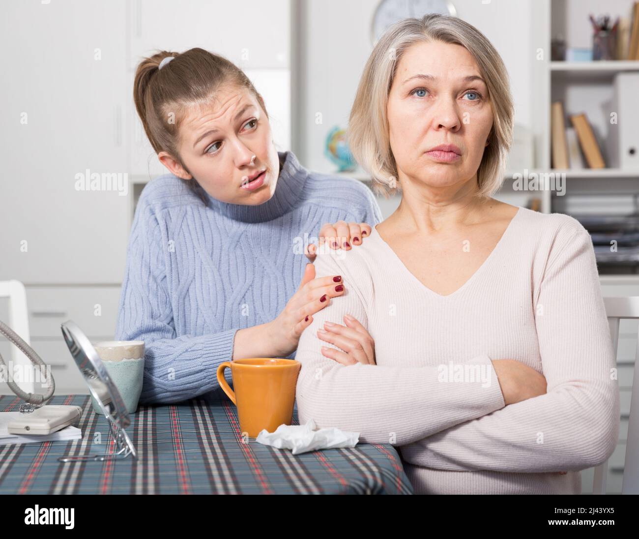 Offended mature woman turned away Stock Photo - Alamy