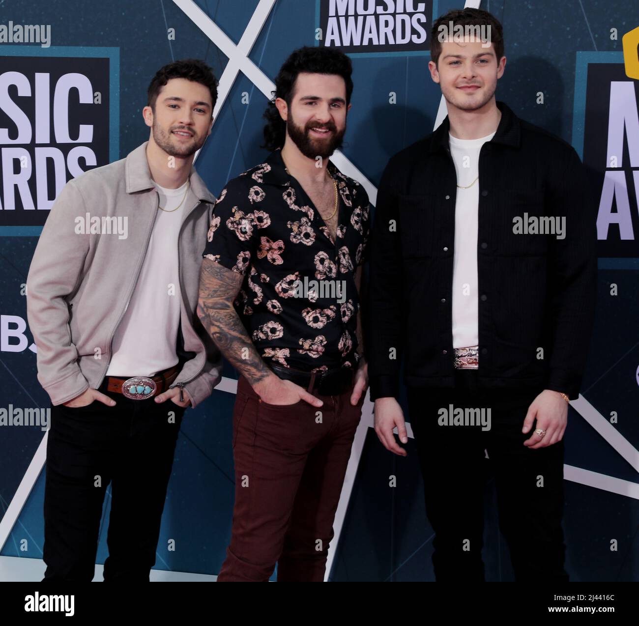 Restless Road is photographed on the red carpet for the CMT Music ...