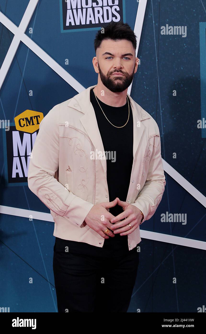 Dylan Scott is photographed on the red carpet for the CMT Music Awards ...