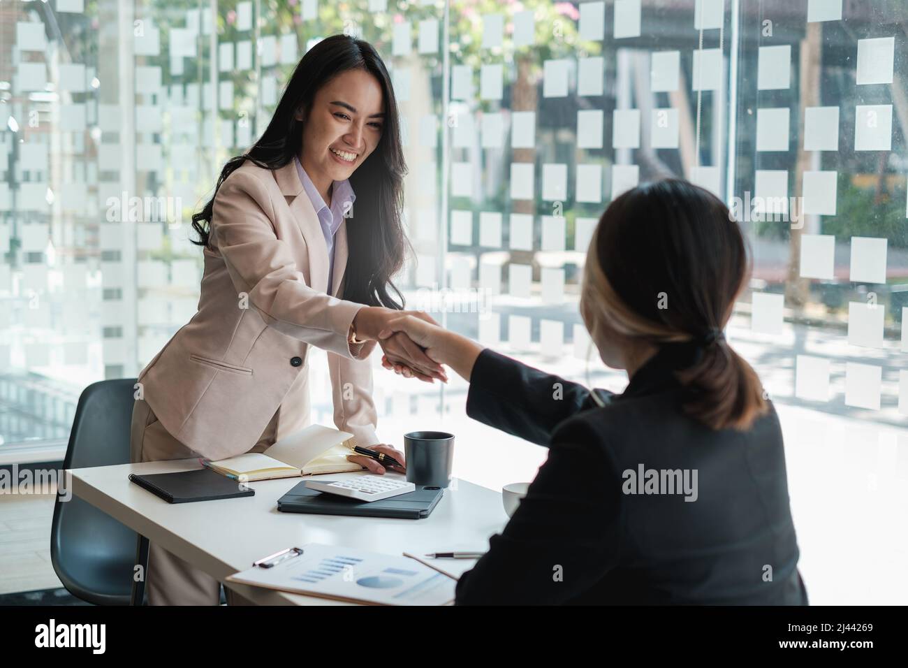 Business people successful negotiation and handshake. celebration ...