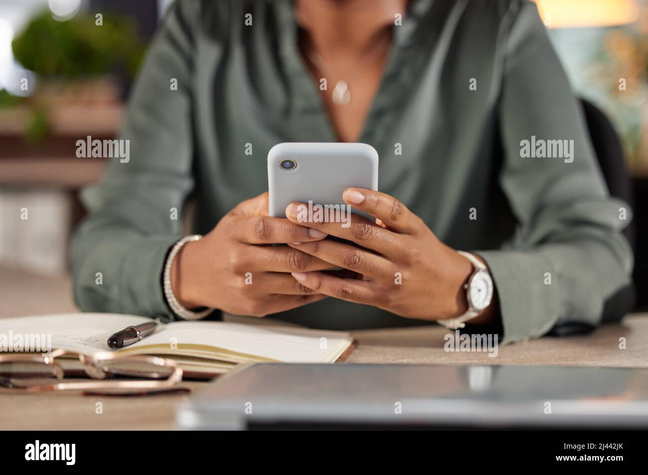 Getting you an answer asap. Cropped shot of an unrecognizable ...