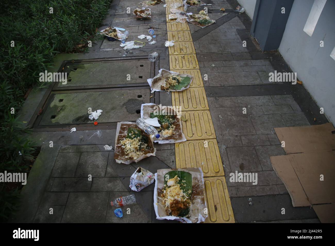 The rest of the food packaging waste was scattered after being eaten by ...