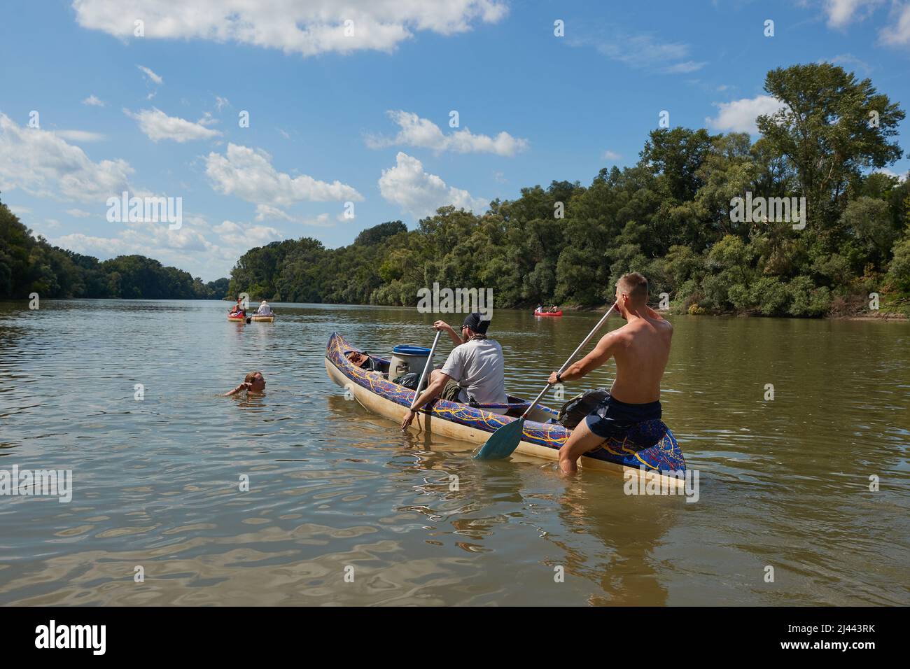 Canoe tour river swim Stock Photo - Alamy