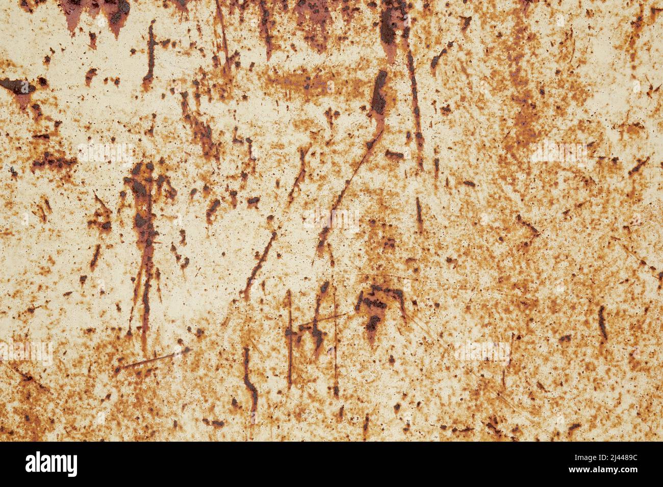 Brown beige abstract textured background with red hues. A weathered ...