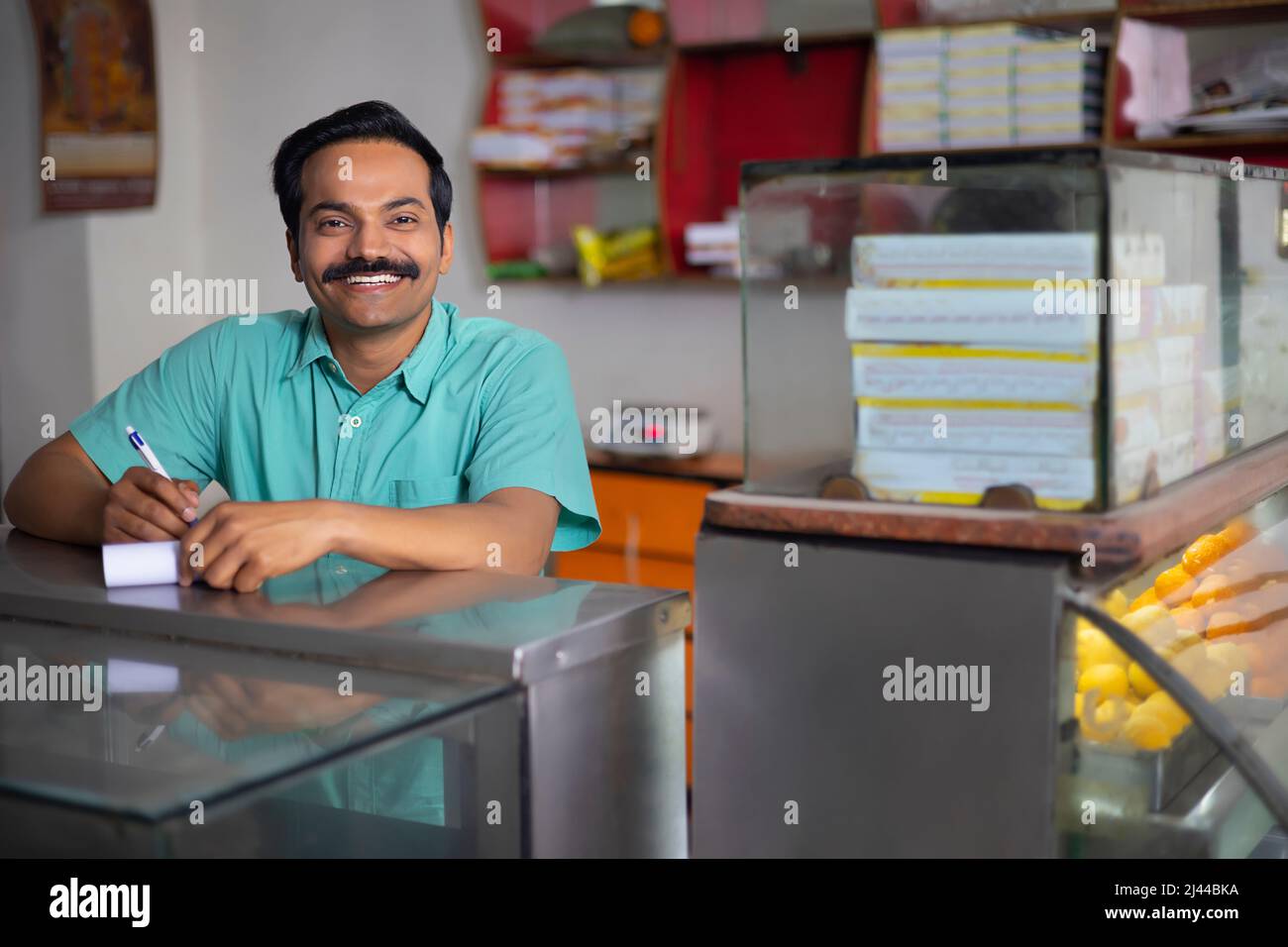 Owner looking hi-res stock photography and images - Alamy
