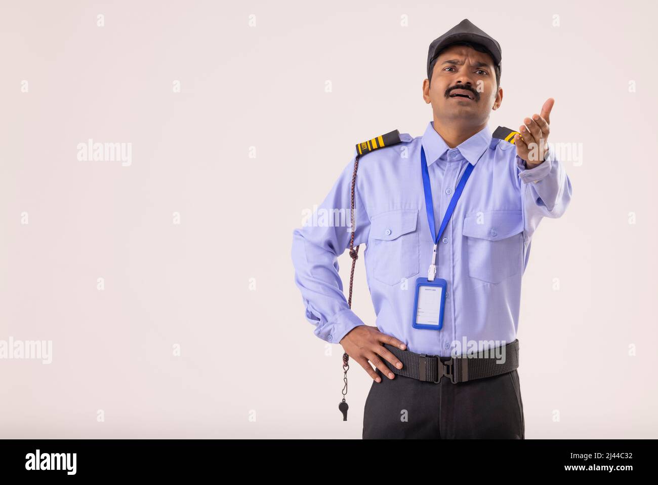 Portrait of Security guard objecting to something Stock Photo - Alamy