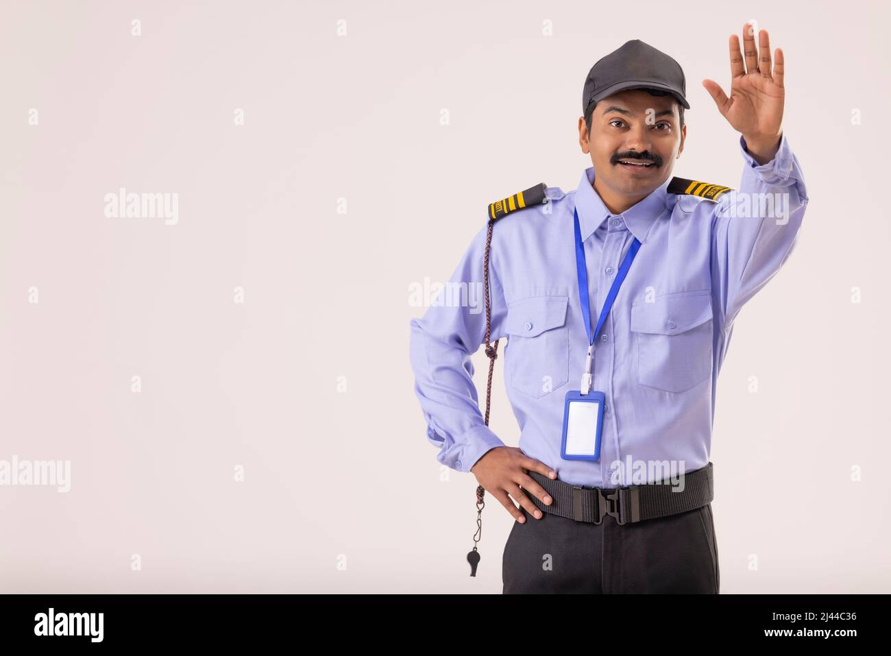 Portrait of Security guard gesturing with his palm Stock Photo - Alamy