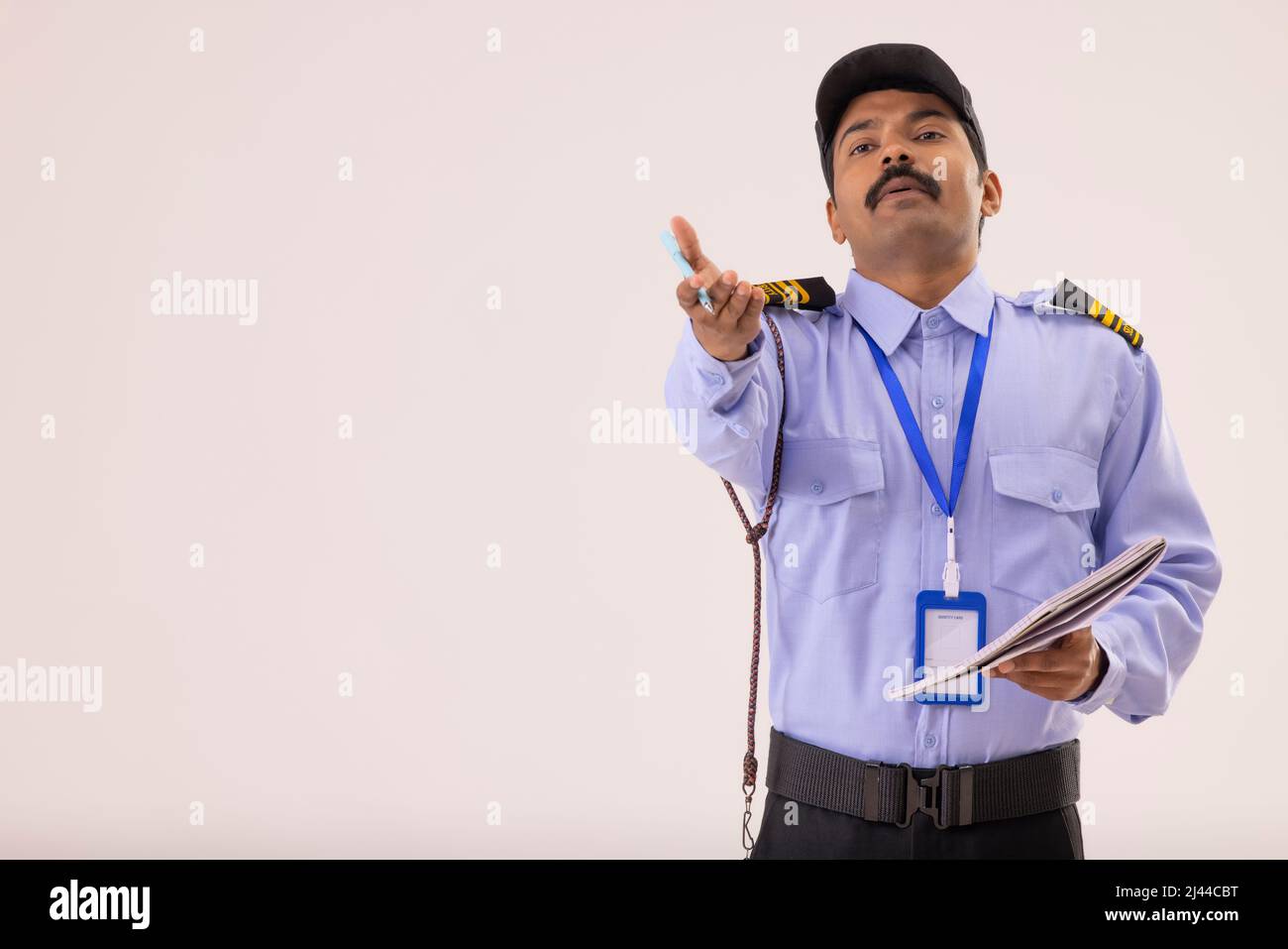 Portrait of Security guard objecting to something Stock Photo - Alamy