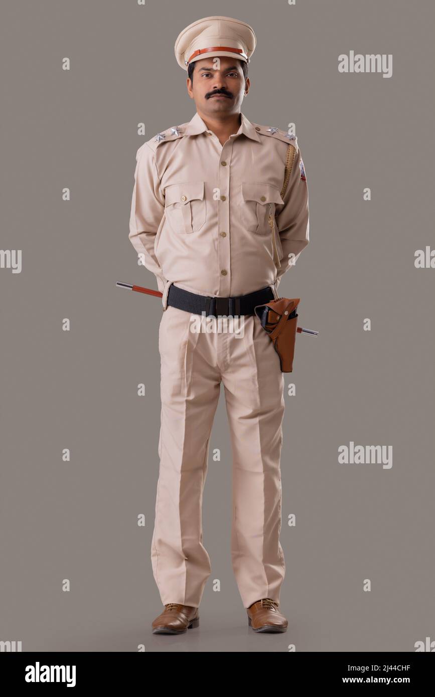 Indian Police Officer With Gun