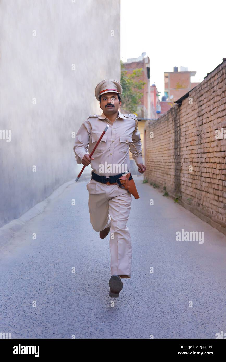 Indian police with gun full view hi-res stock photography and images ...
