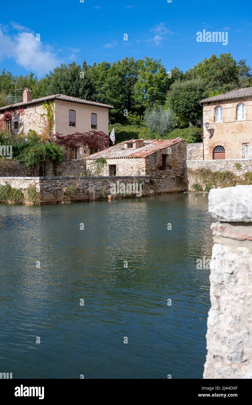 Ancient natural hot springs stone pool in small Italian village Bagno ...