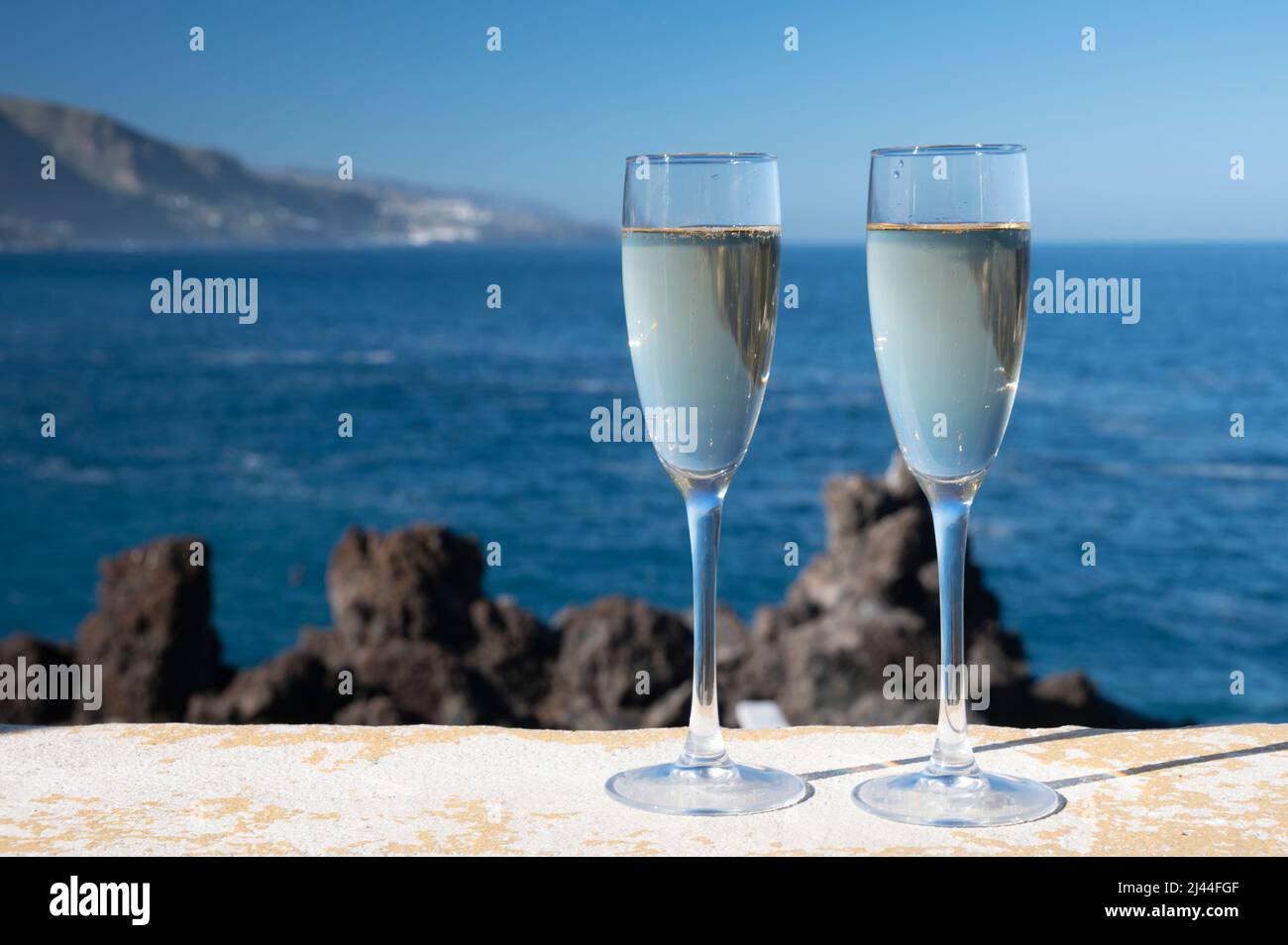 New year celebration with two glasses of champagne or Spanish cava ...