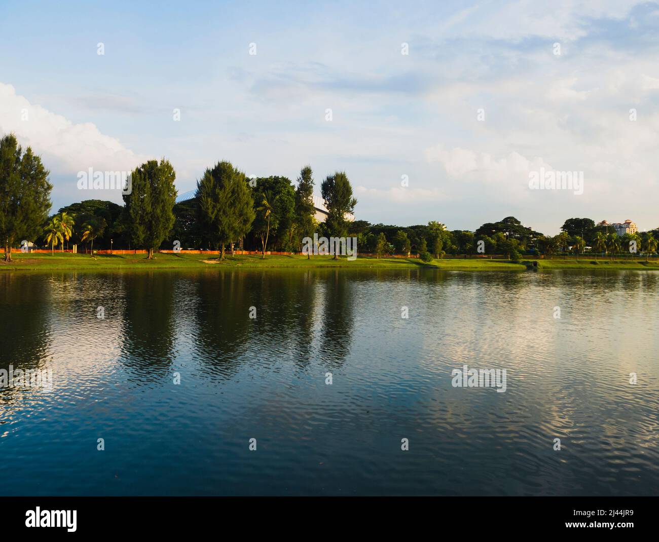 Summer landscape with a river, during sunset Stock Photo - Alamy