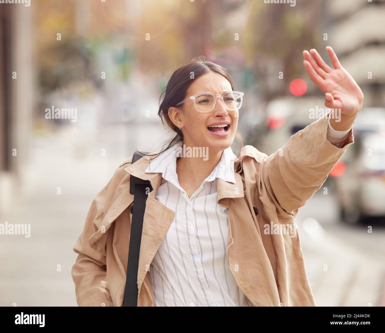 Panic is anxiety on fire. Shot of a beautiful young woman trying to ...