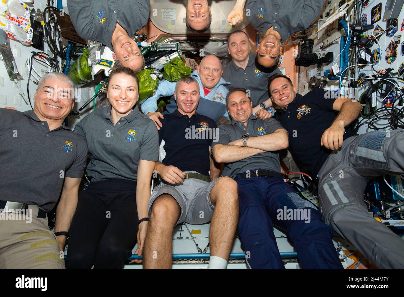 ISS - 30 March 2022 - The ten-member Expedition 66 crew poses for a ...