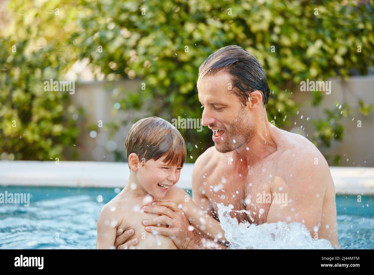 Father and son at swimming pool hi-res stock photography and images - Alamy