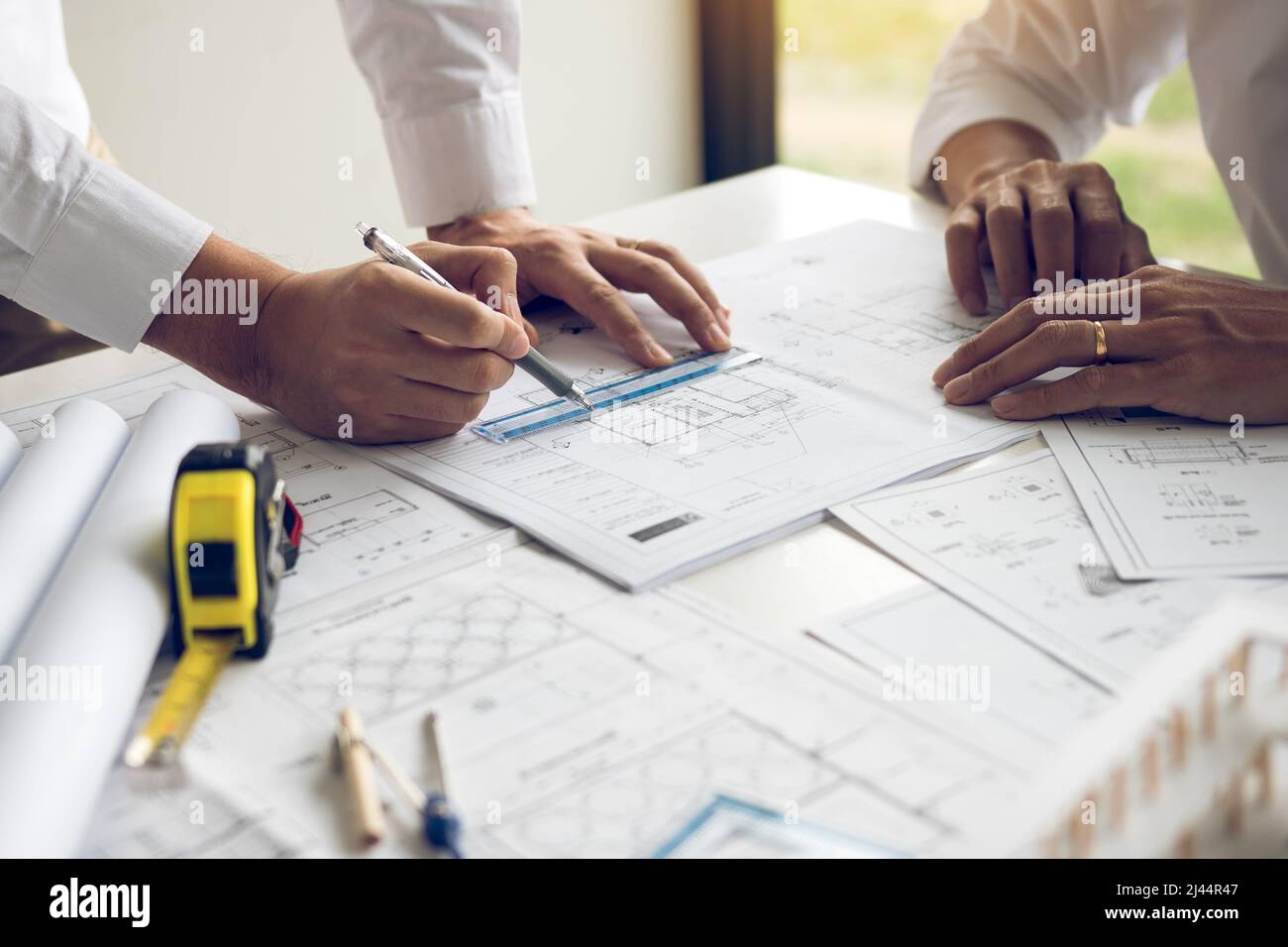 The partnership engineering man or co-workers working on a project and ...