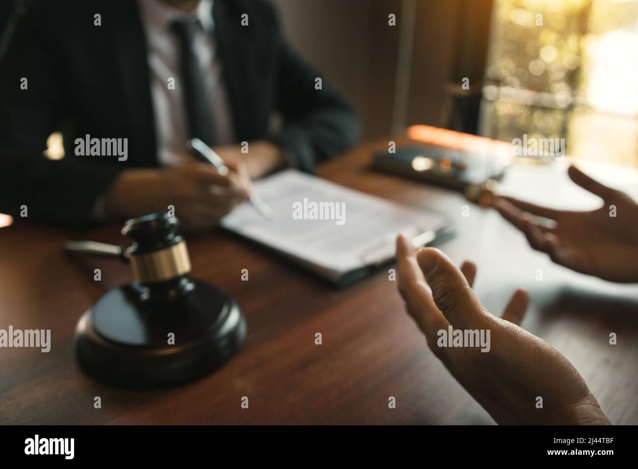 Lawyer is explaining about the wrongdoing laws regarding fraud to the ...